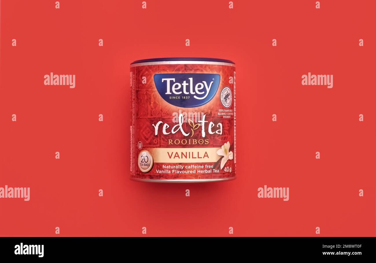 Tetley caffeine free Red Tea Rooibos Vanilla against a red background ...