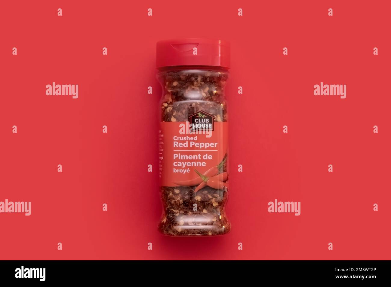 Club House Crushed Red Pepper spice against a red background Stock ...