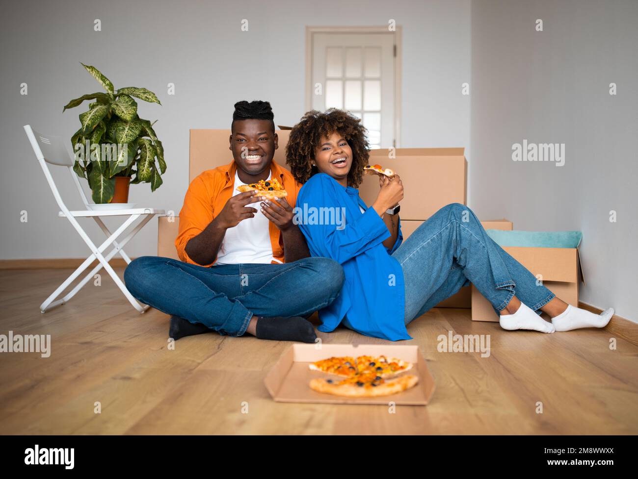 Family resting after moving hi-res stock photography and images - Alamy