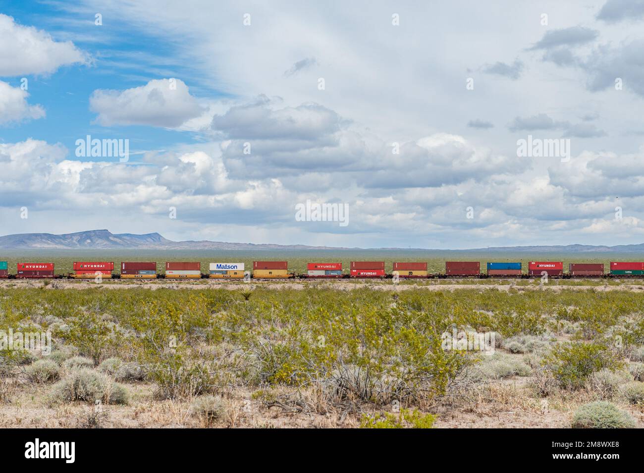 Long cargo train running through the Mojave desert in Nevada Stock ...