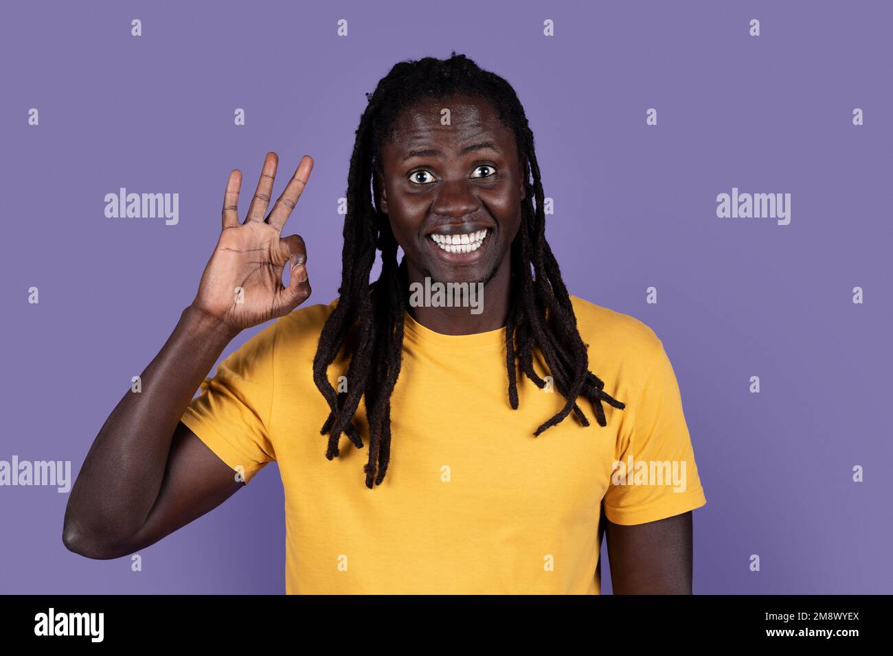 Black guy showing ok hi-res stock photography and images - Alamy