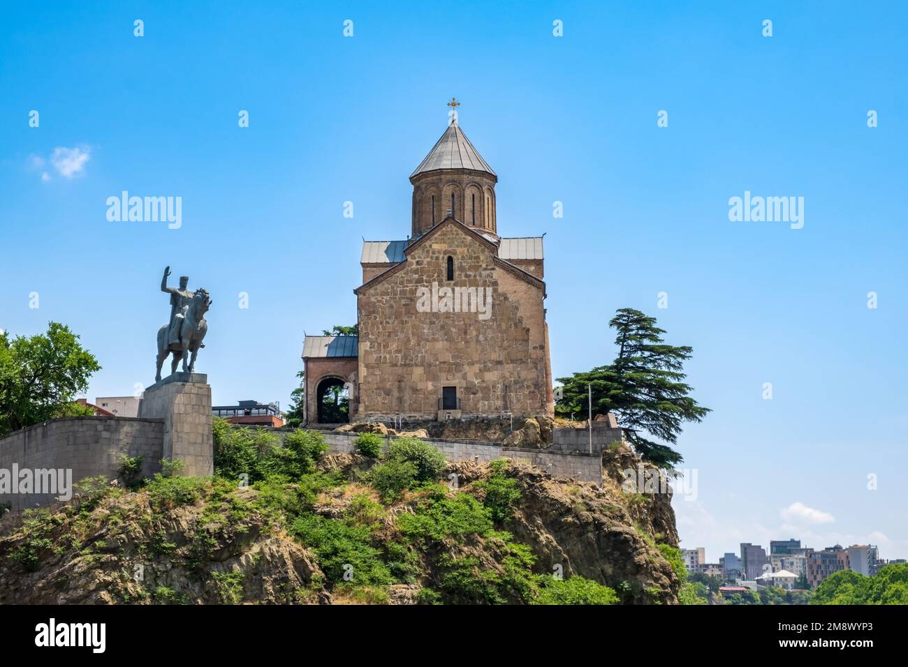 Metekhi church and monument of King Vakhtang Gorgasali on cliff in ...