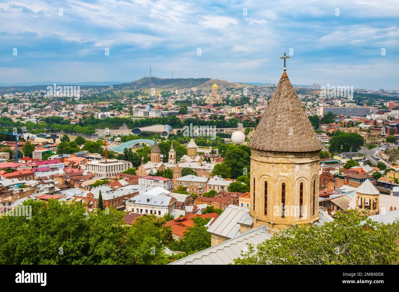 Tbilisi old town with ancient churches and modern architecture, Georgia ...
