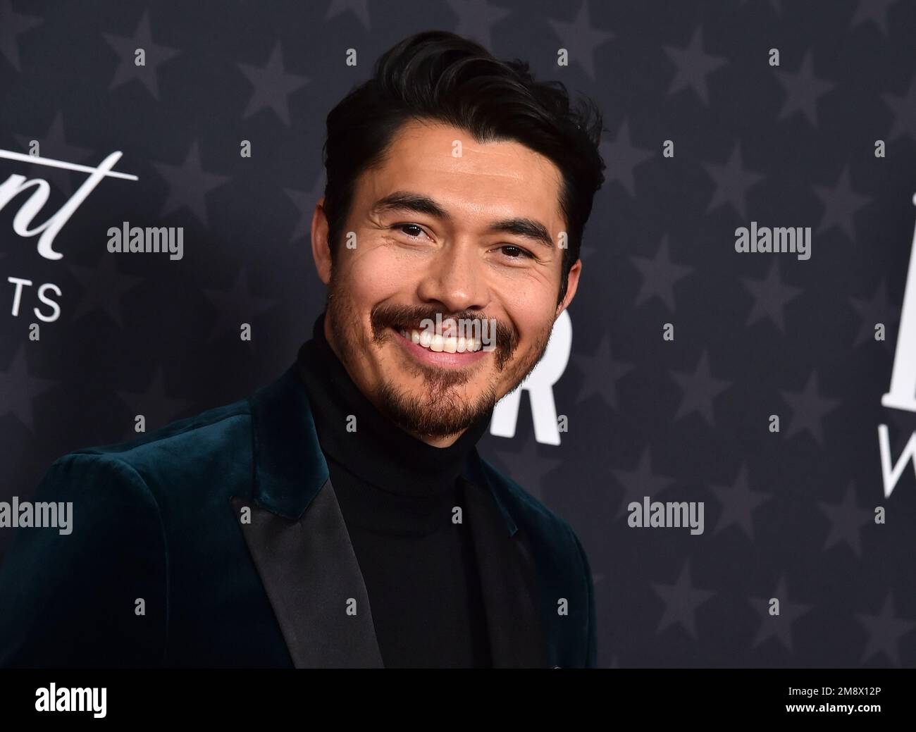 Henry Golding arrives at the 28th annual Critics Choice Awards at The ...