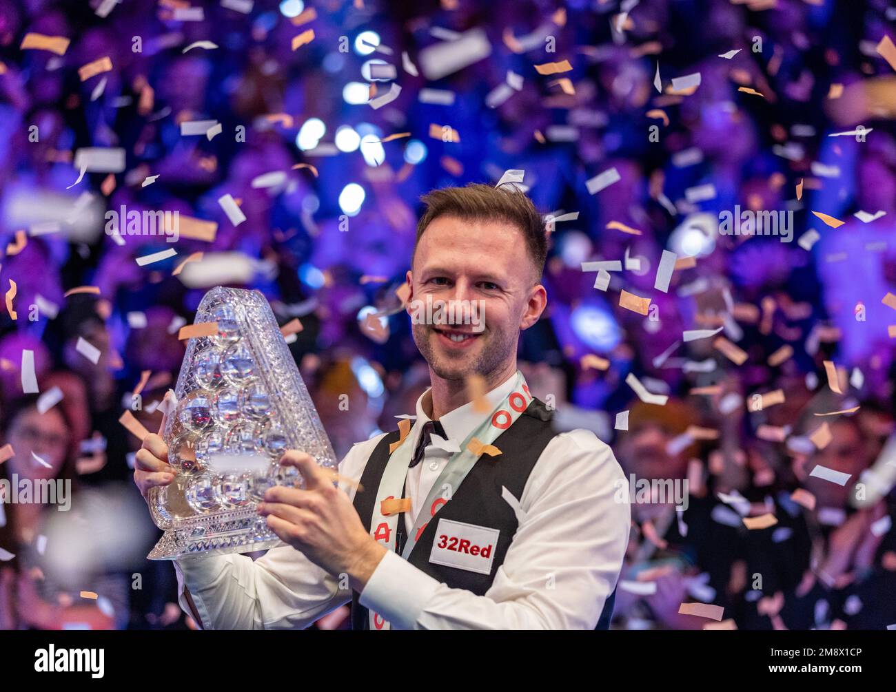 Judd Trump celebrates with the Paul Hunter Trophy after winning the ...