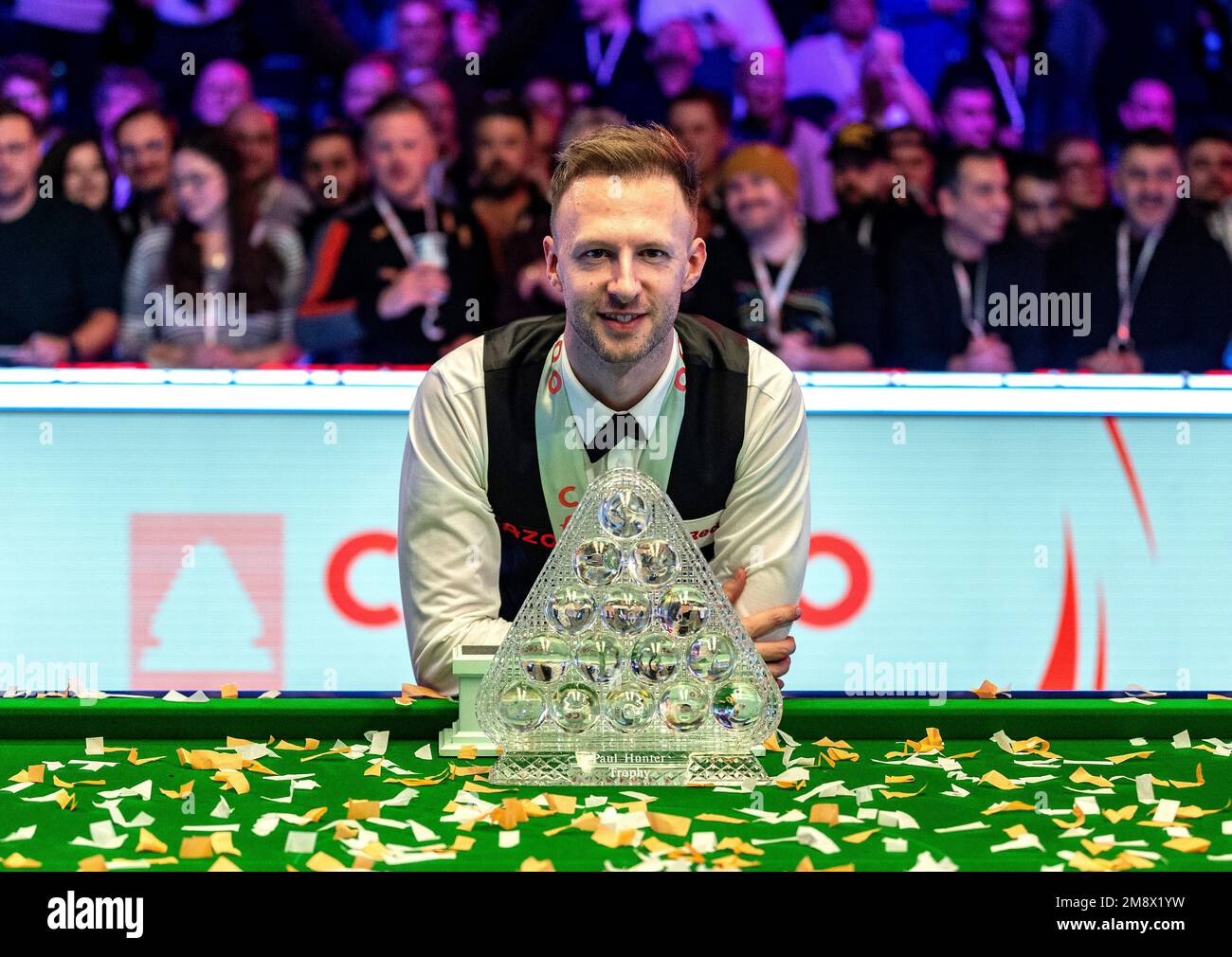 Judd Trump celebrates with the Paul Hunter Trophy after winning the ...