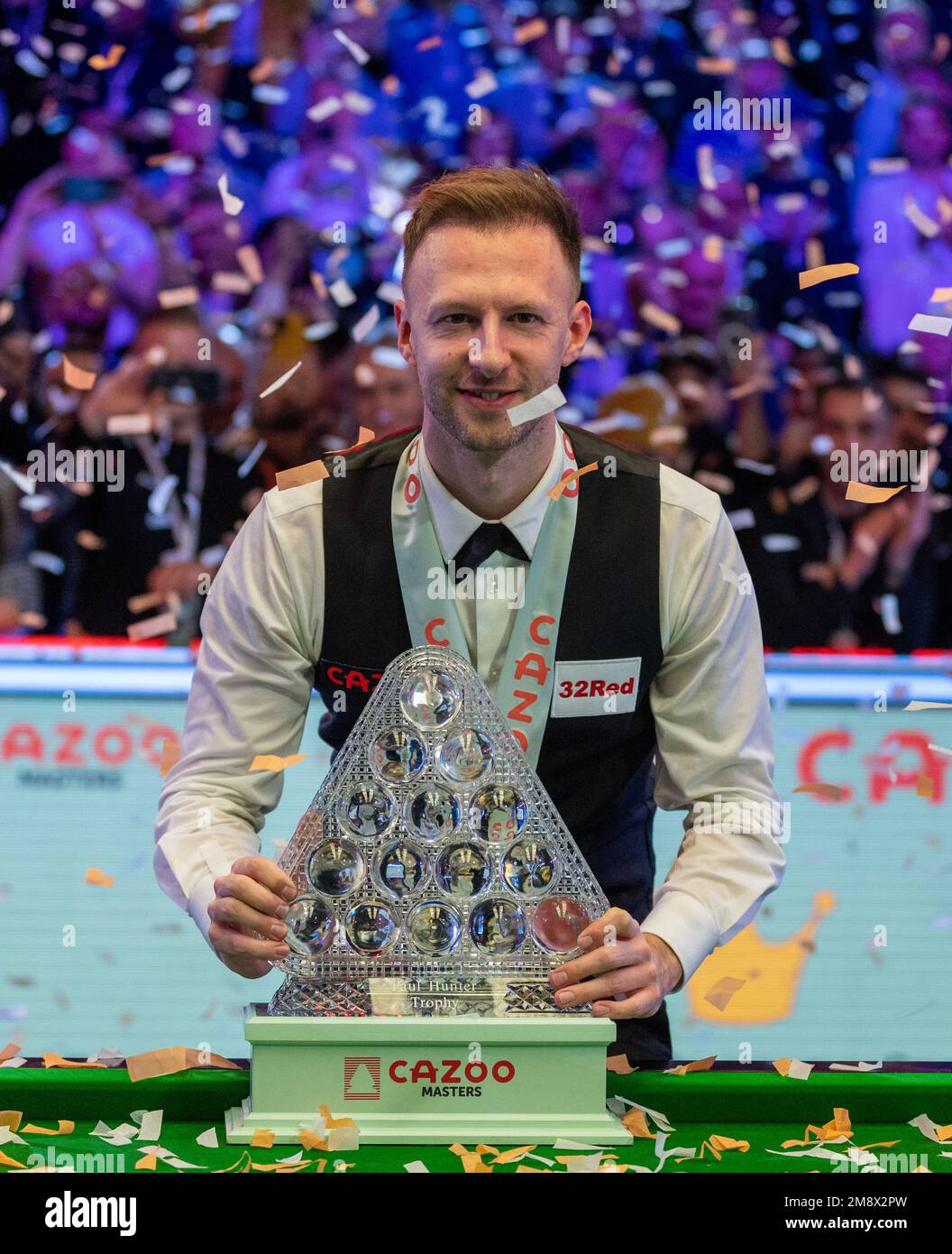 Judd Trump celebrates with the Paul Hunter Trophy after winning the ...