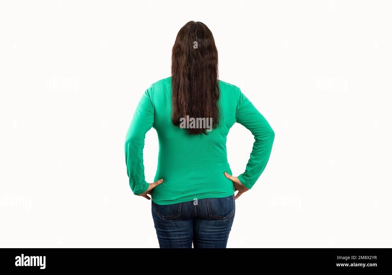 Young Beautiful Woman Wearing Green T Shirt Standing Over White