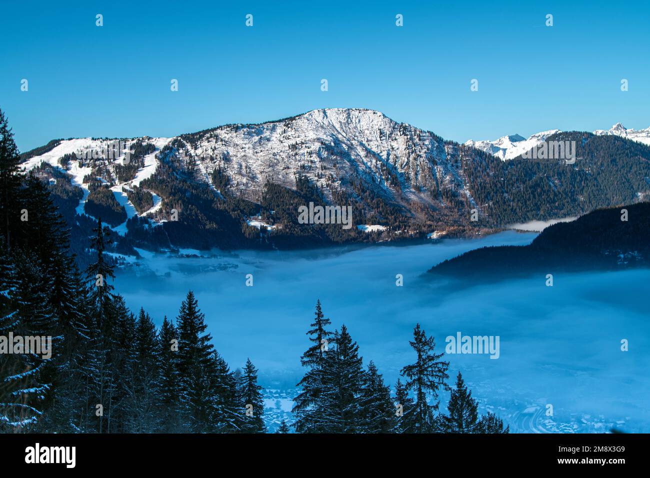 a cloud inversion envelopes Chamonix Valley in the French Alps Stock ...