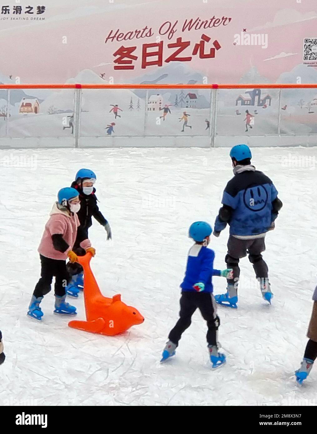SHANGHAI, CHINA - JANUARY 15, 2023 - People and children skate at an ...