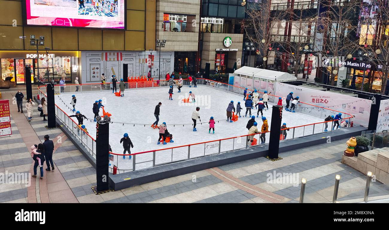 SHANGHAI, CHINA - JANUARY 15, 2023 - People and children skate at an ...