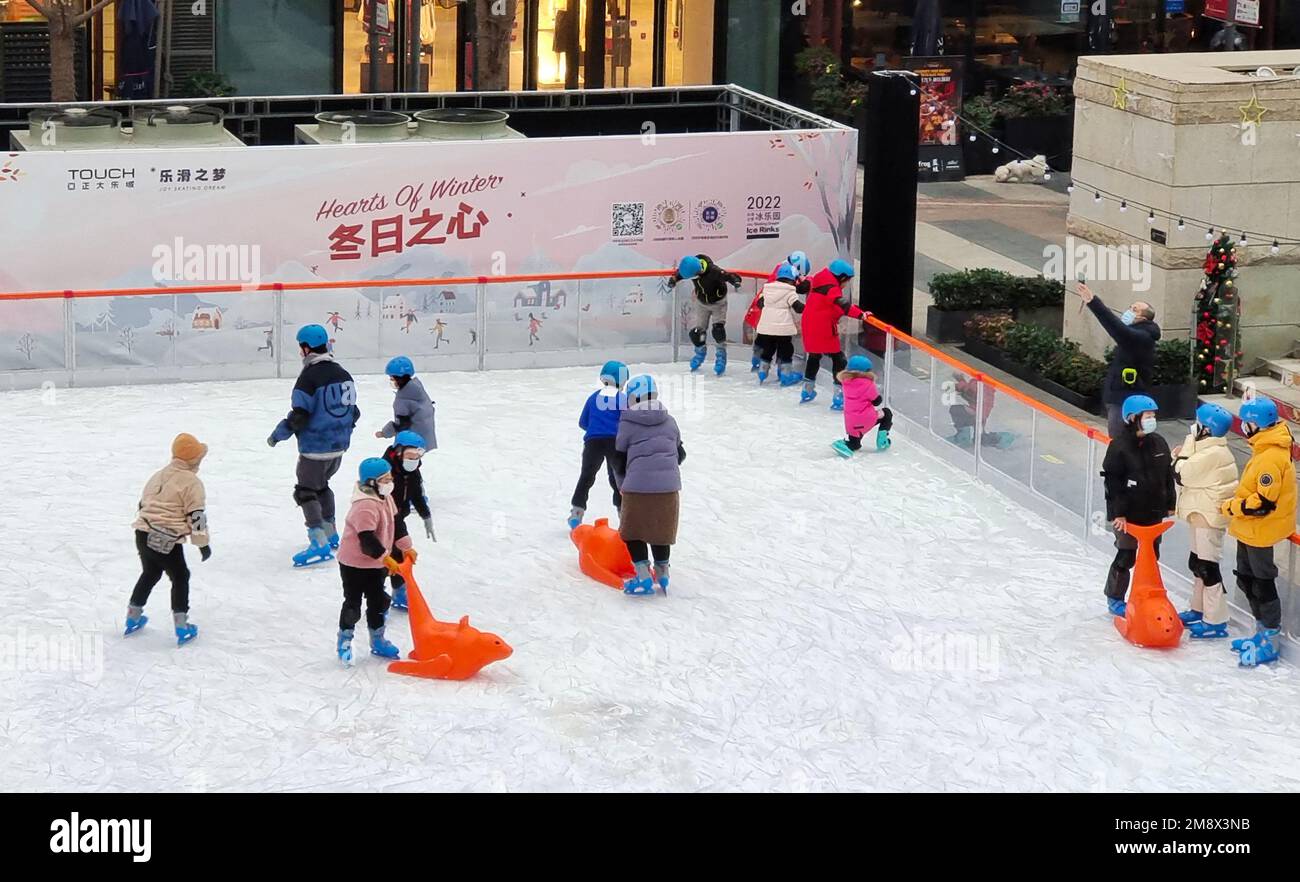 SHANGHAI, CHINA - JANUARY 15, 2023 - People and children skate at an ...