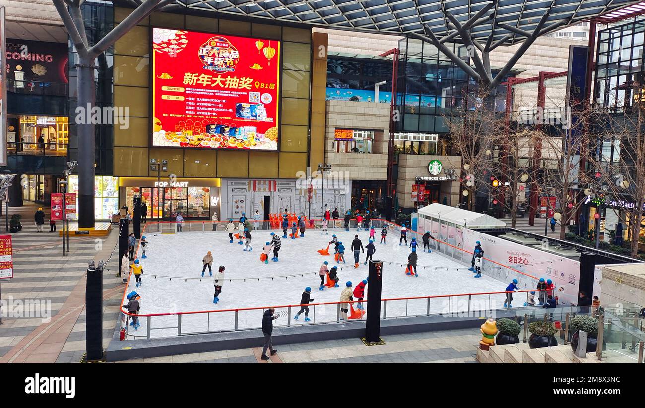 SHANGHAI, CHINA - JANUARY 15, 2023 - People and children skate at an ...