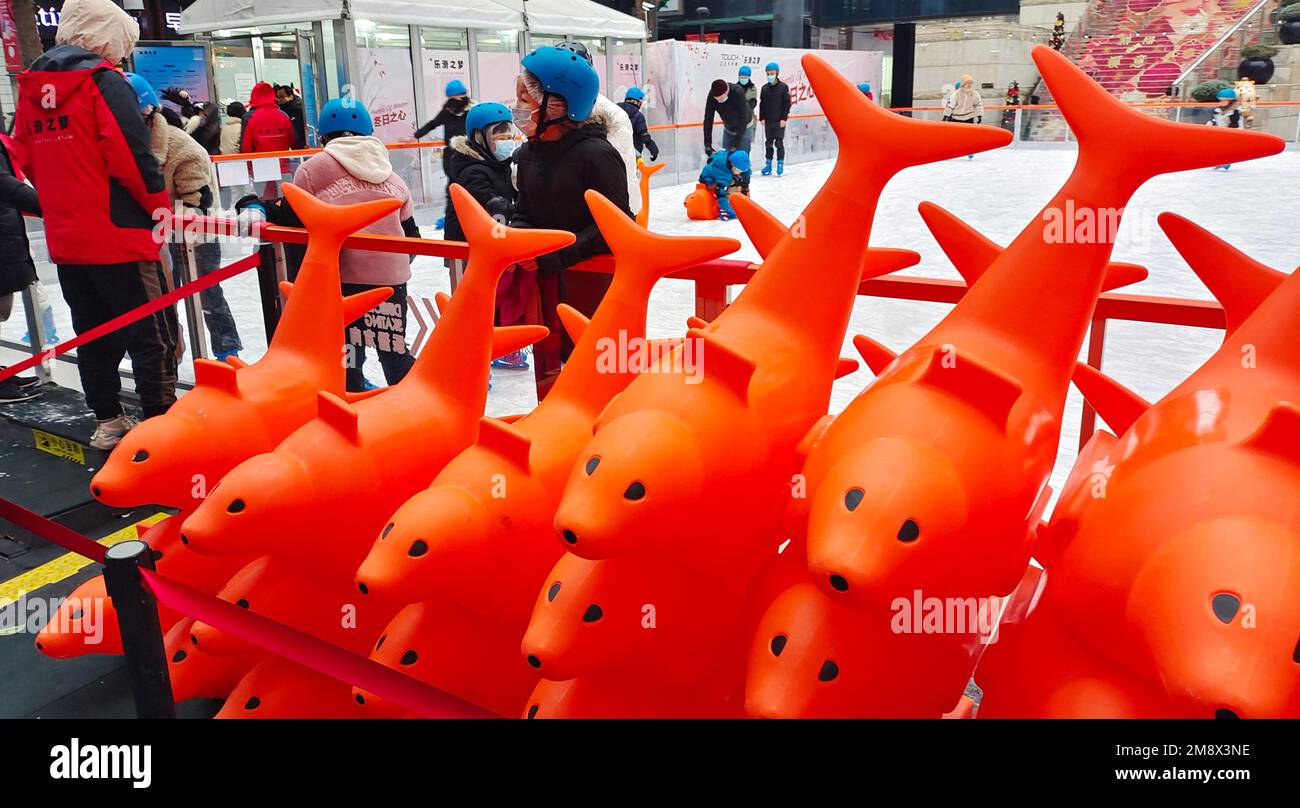 SHANGHAI, CHINA - JANUARY 15, 2023 - People and children skate at an ...