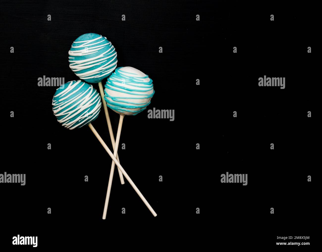 Teal and white cake pops Stock Photo - Alamy