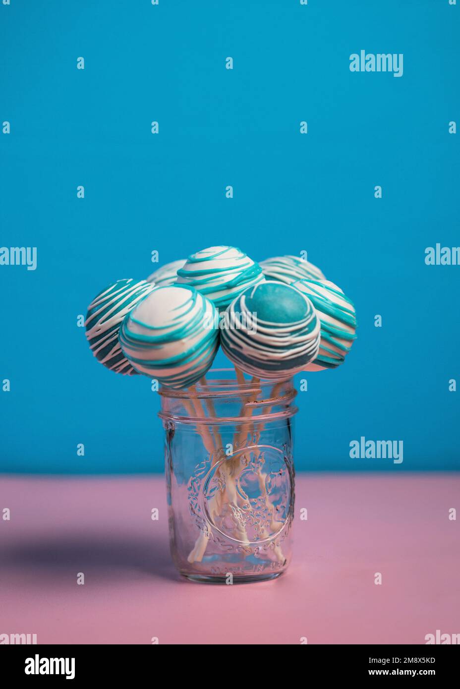 Teal and white cake pops Stock Photo - Alamy