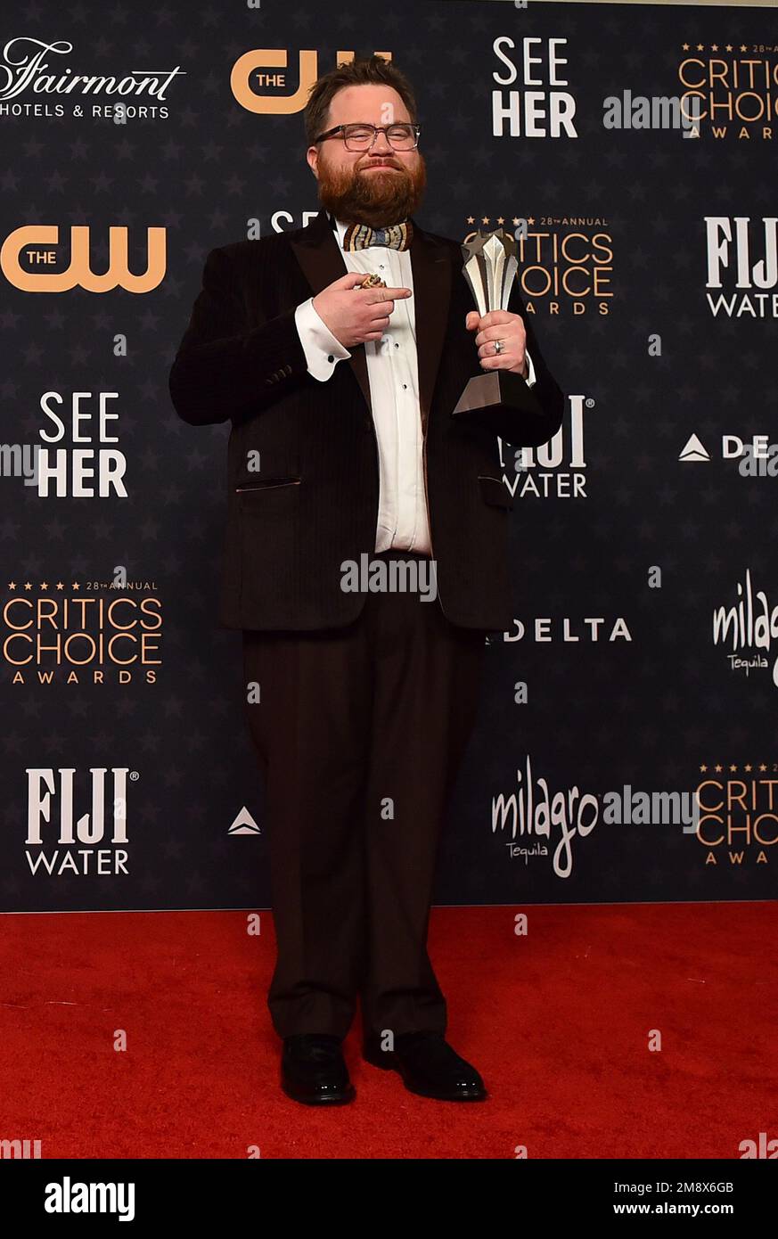 Paul Walter Hauser poses in the press room with the award for best ...