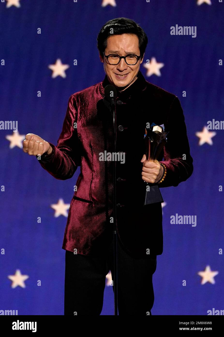 Ke Huy Quan accepts the award for best supporting actor for "Everything ...