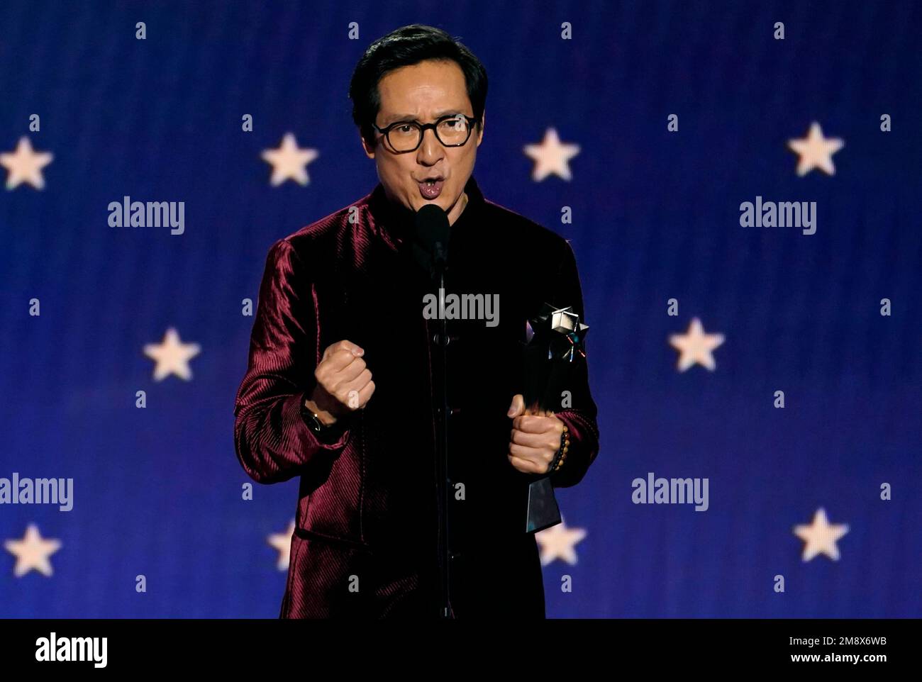 Ke Huy Quan accepts the award for best supporting actor for "Everything ...