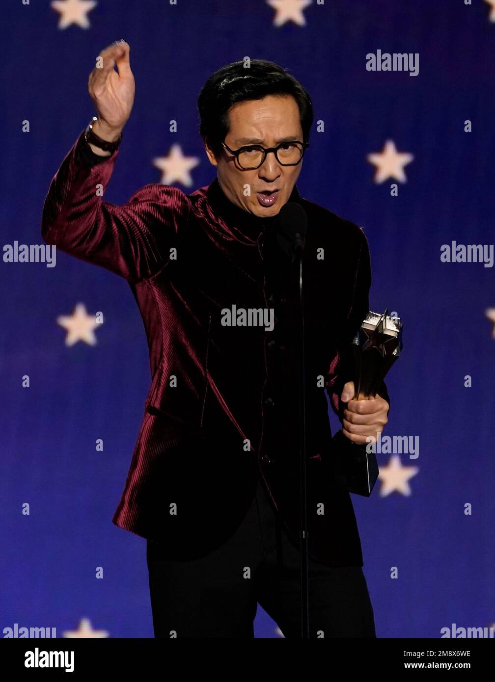 Ke Huy Quan accepts the award for best supporting actor for "Everything ...