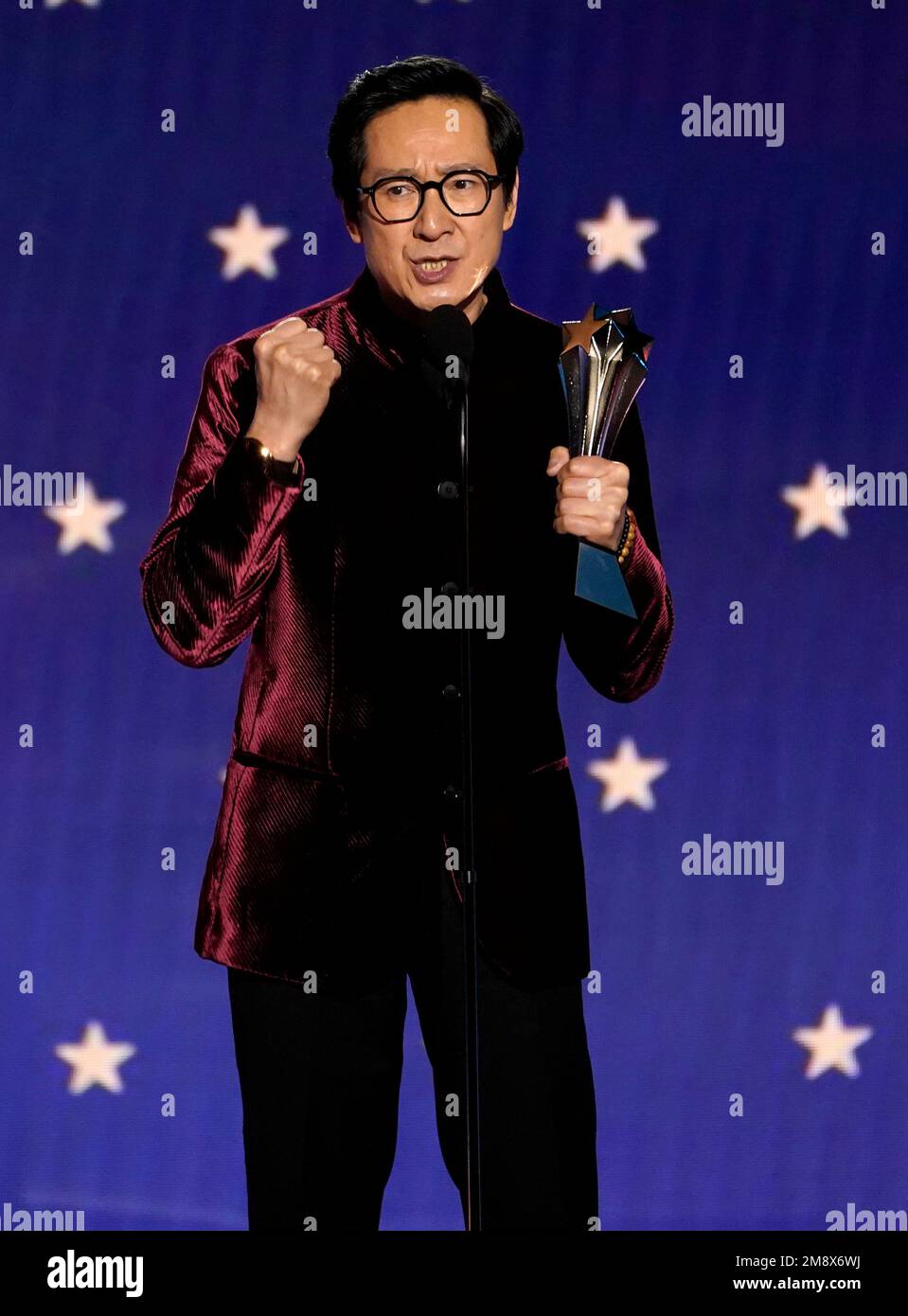 Ke Huy Quan accepts the award for best supporting actor for "Everything ...