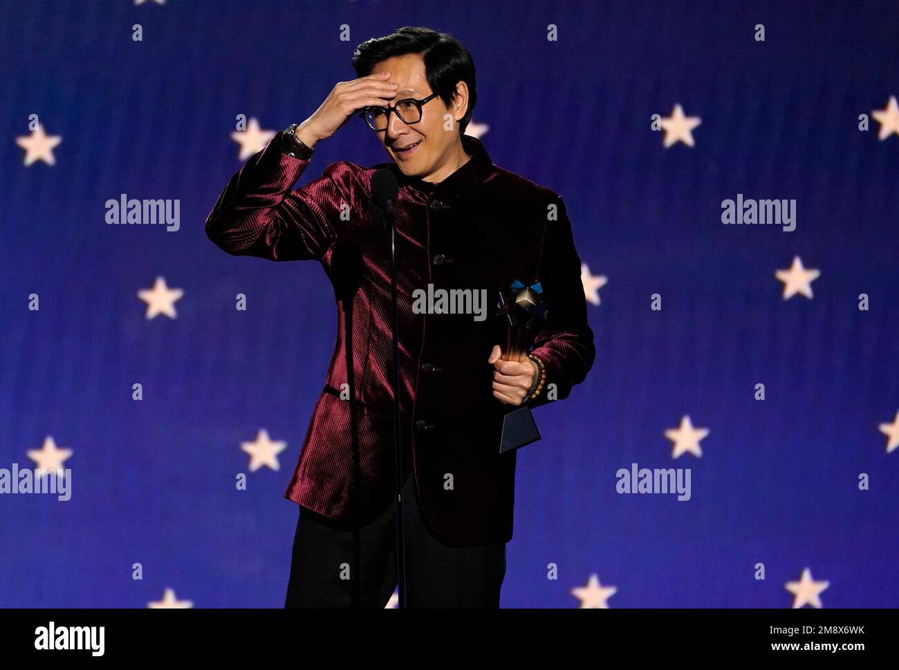 Ke Huy Quan accepts the award for best supporting actor for "Everything ...