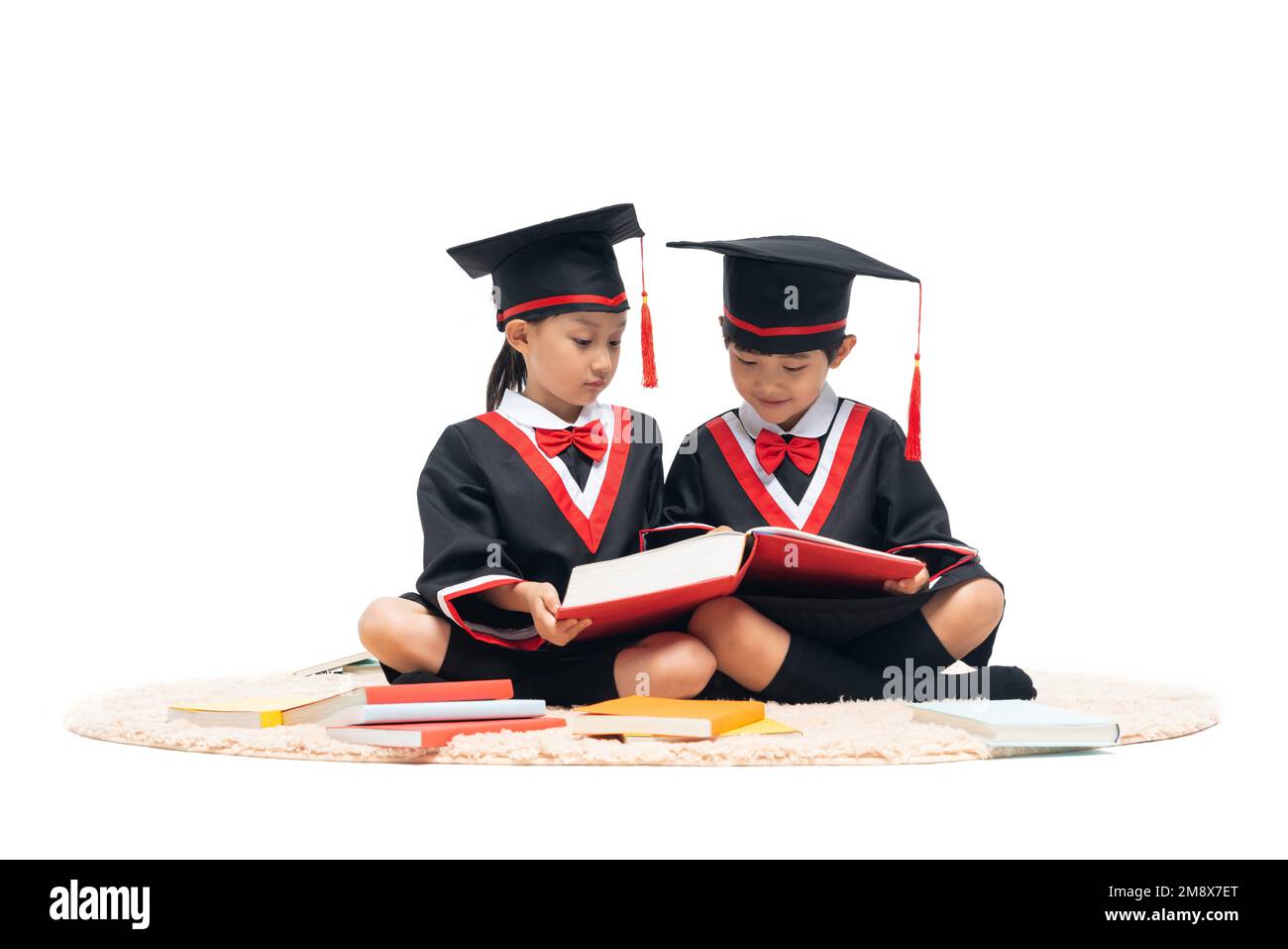 Children with a doctorial hat Stock Photo - Alamy