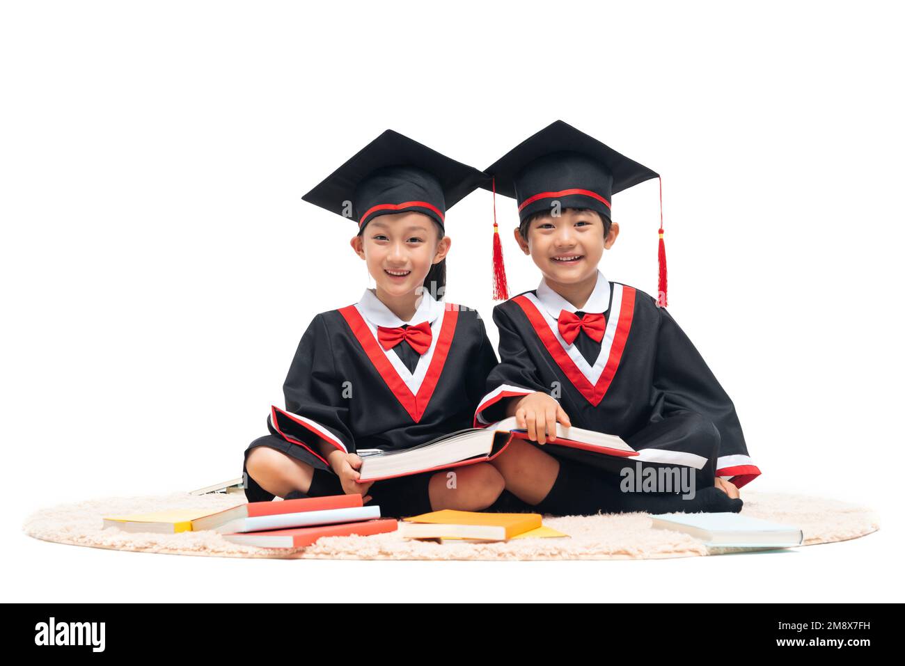 Children with a doctorial hat Stock Photo - Alamy
