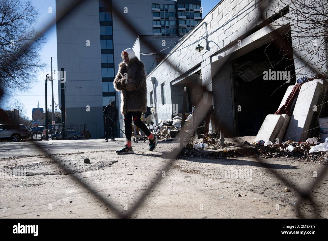 Atlanta, Georgia, USA. 15th Jan, 2023. A homeless couple tries to tidy ...