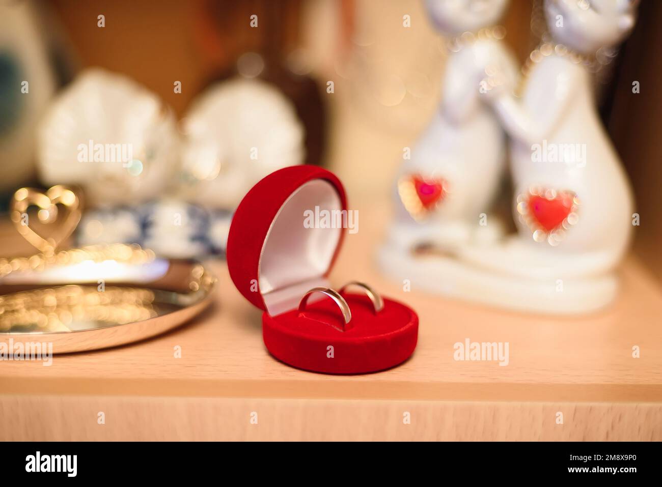 Golden ring in red box hi-res stock photography and images - Alamy