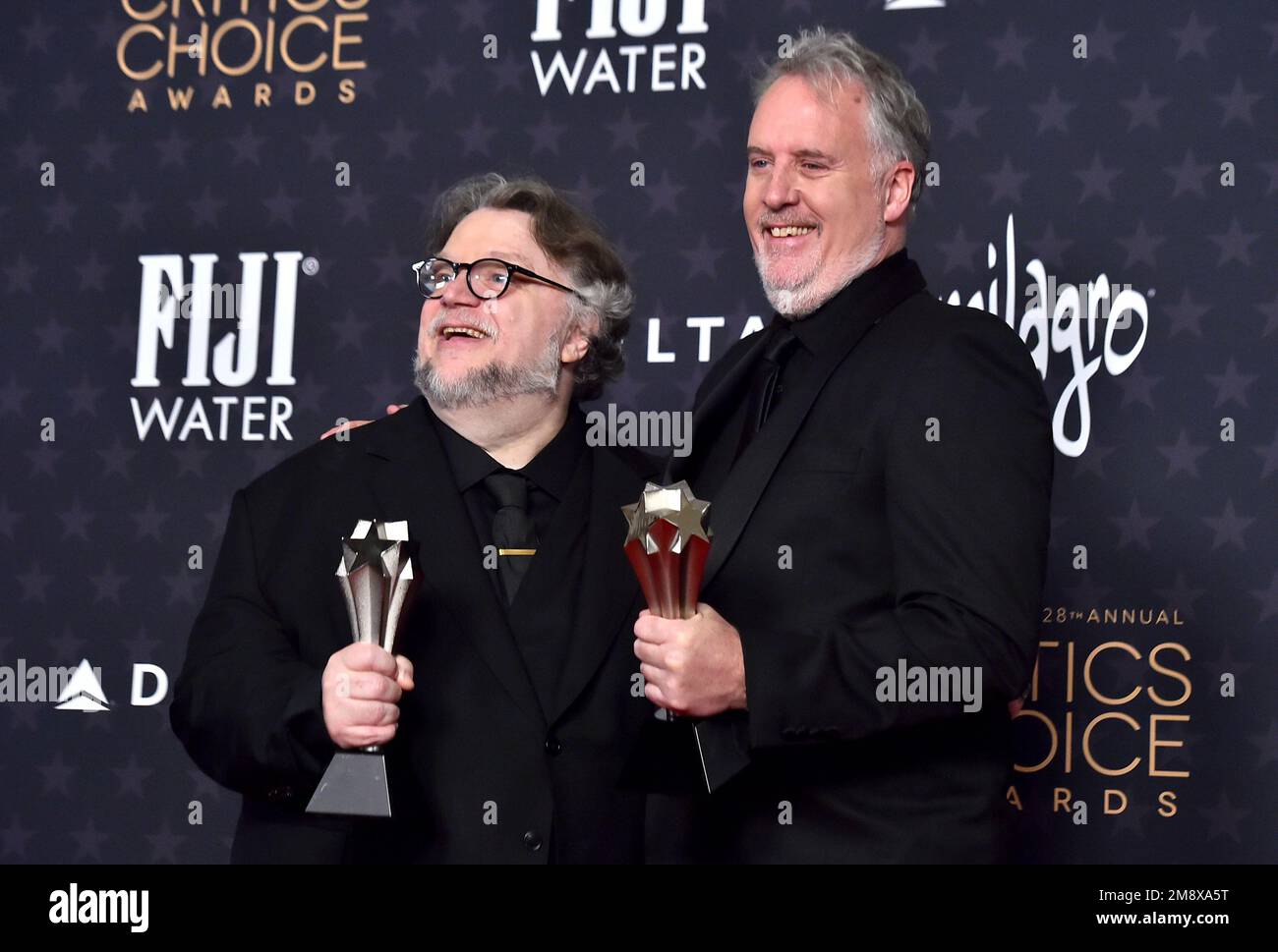 Guillermo del Toro, left, and Mark Gustafson pose with the award for ...