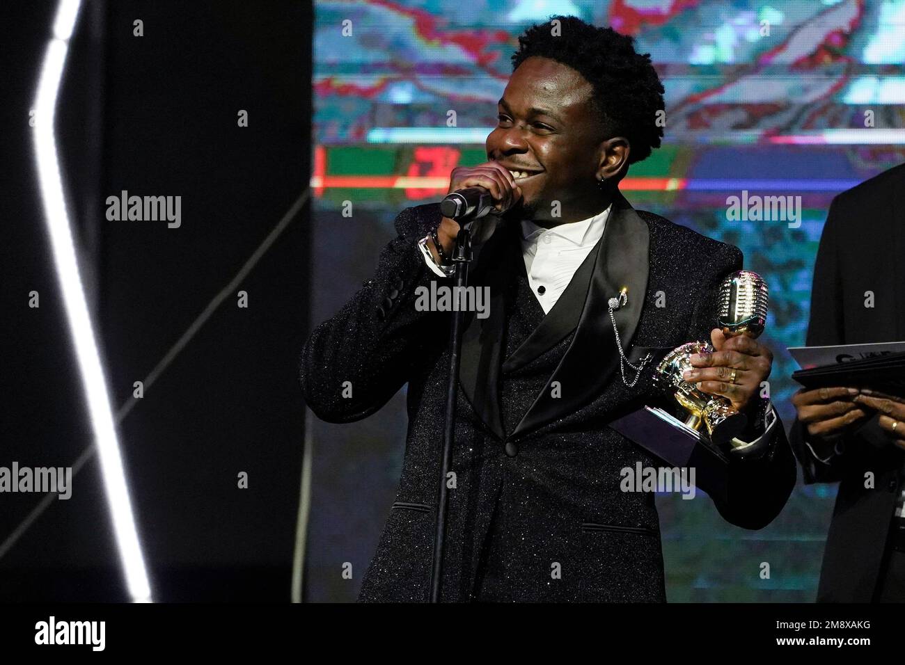 Singer Didi B from Ivory Coast receives the song of the year award at ...