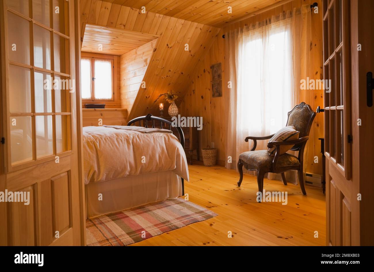 Queen size bed with cast iron tubular footboard, antique wooden ...