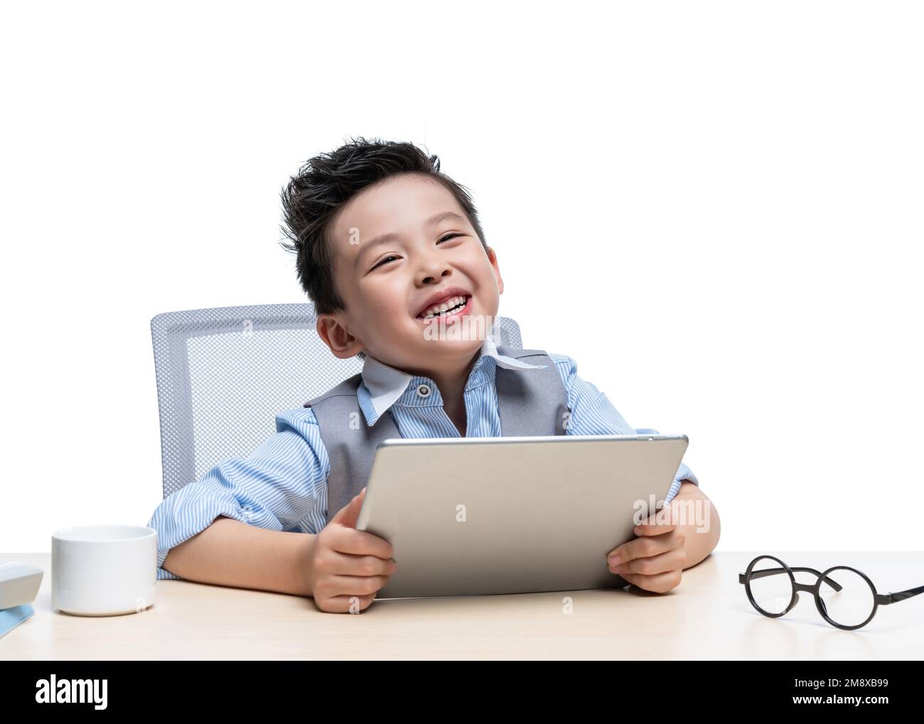 The little boy use tablet computers Stock Photo - Alamy