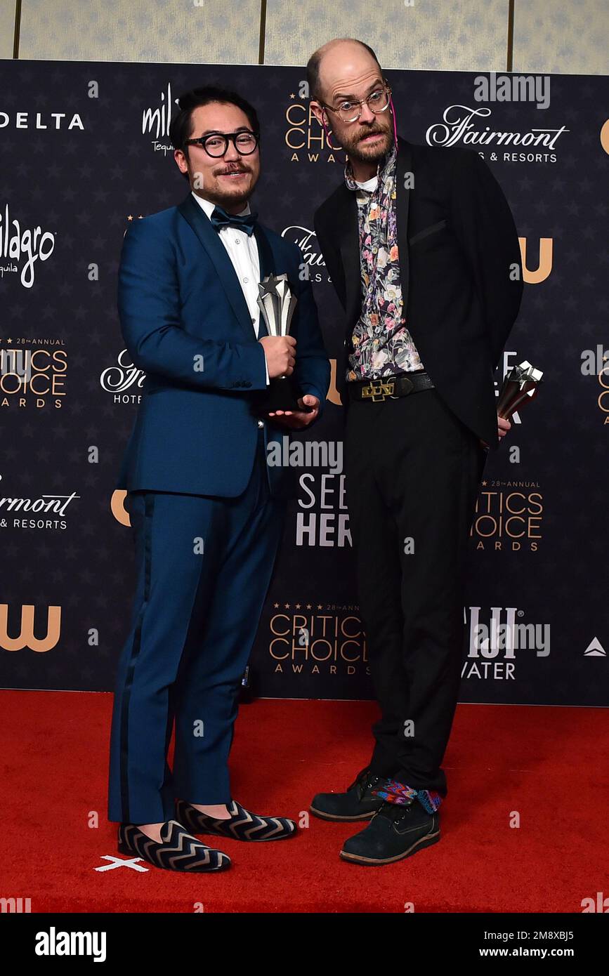 Daniel Kwan, left, and Daniel Scheinert pose in the press room with the ...