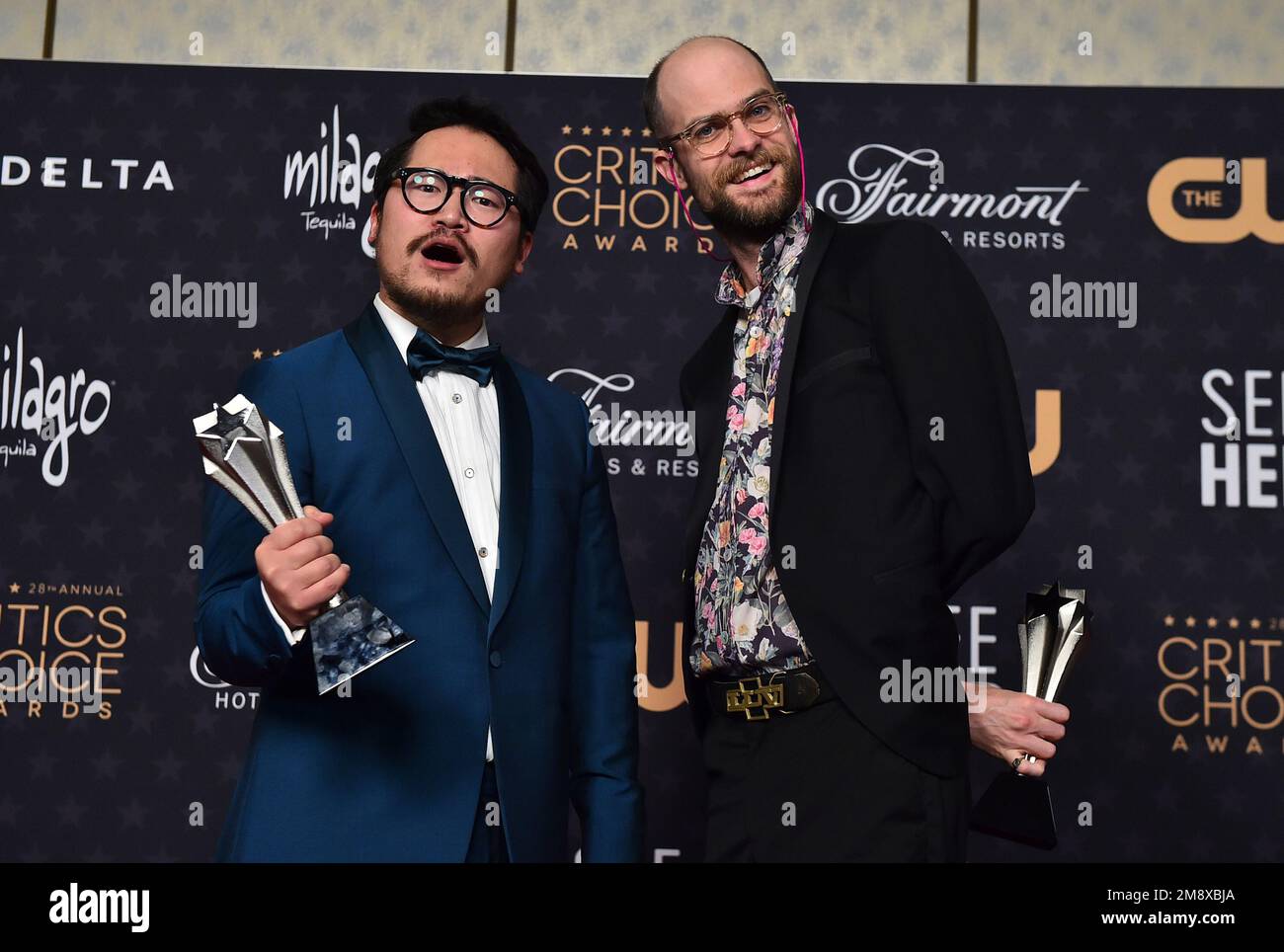 Daniel Kwan, left, and Daniel Scheinert pose in the press room with the ...