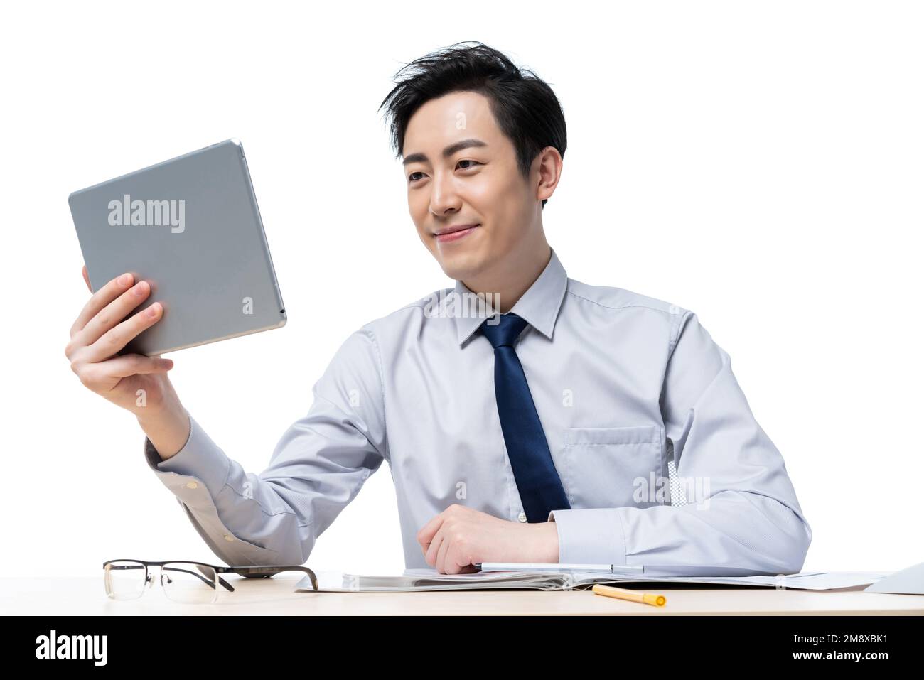 Young business men to use tablet Stock Photo - Alamy