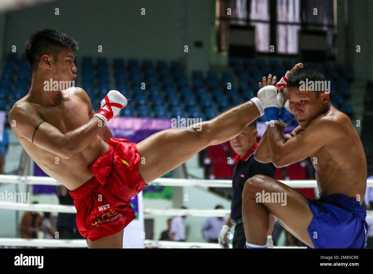 Yangon, Myanmar. 15th Jan, 2023. Zwe Yarman (L) of Myanmar fights with ...