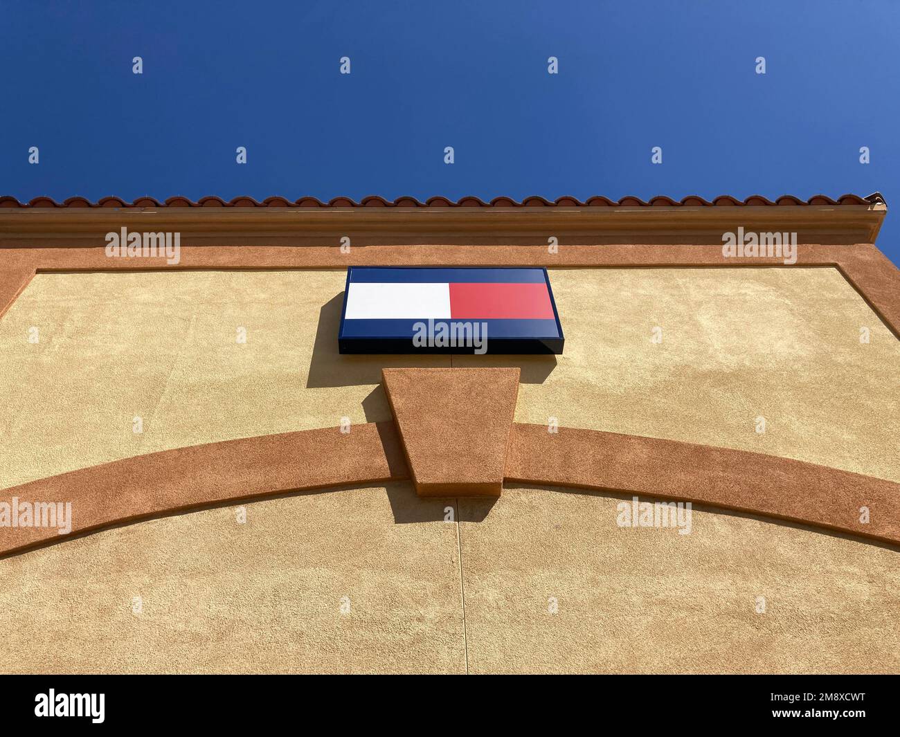 Tommy Hilfiger sign, logo on the store facade at Desert Hills Premium ...