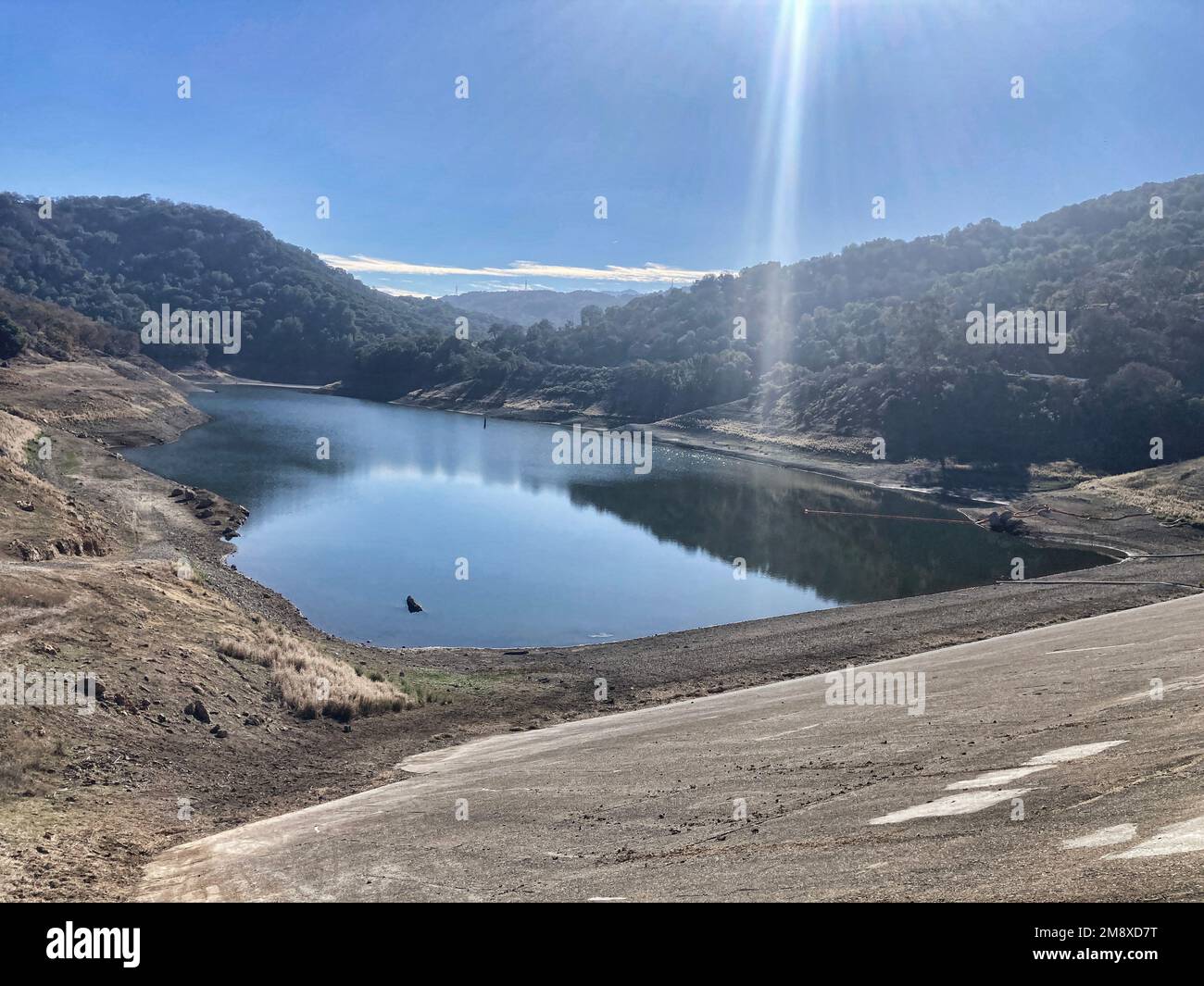 Concrete dam of almost dried, low water level Guadalupe Reservoir ...