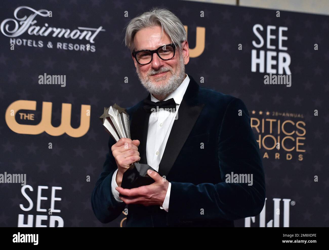 Peter Gould poss in the press room with the award for best drama series ...
