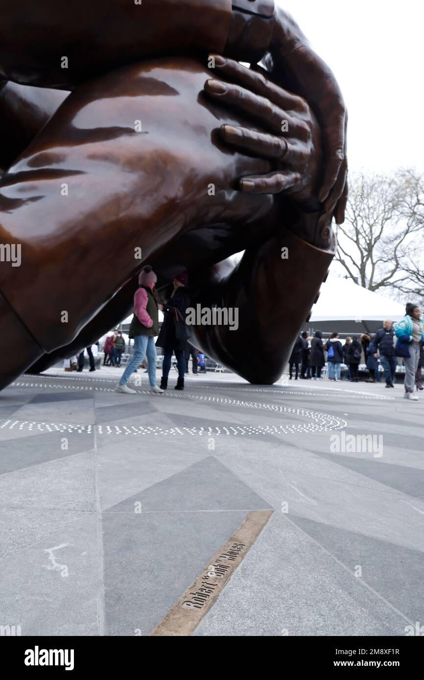 An inscription " Robert "Bob" Moss" is inlayed as people visit the ...