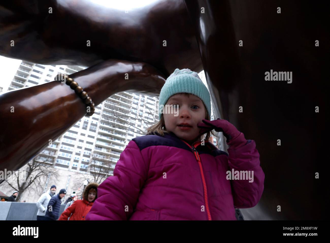 People visit the sculpture entitled “The Embrace “ by artist Hank ...