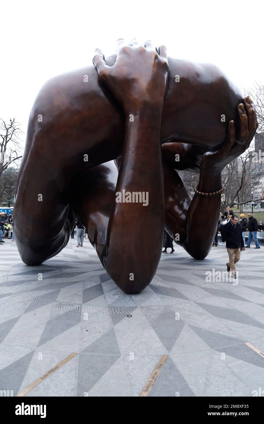 People visit the sculpture entitled “The Embrace “ by artist Hank ...