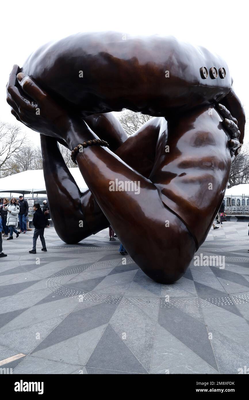 People visit the sculpture entitled “The Embrace “ by artist Hank ...