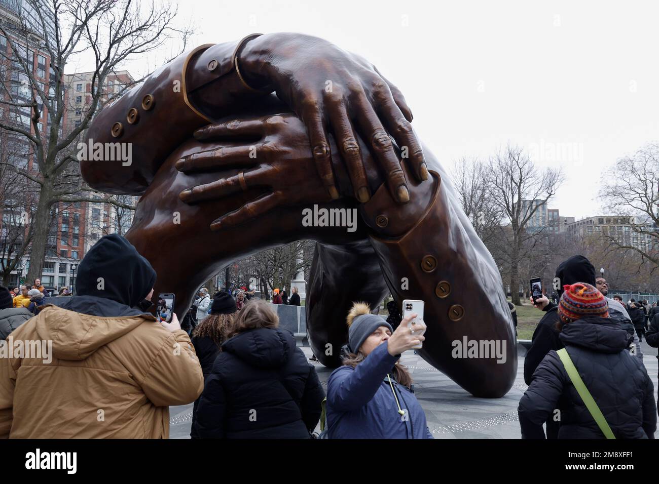People visit the sculpture entitled “The Embrace “ by artist Hank ...