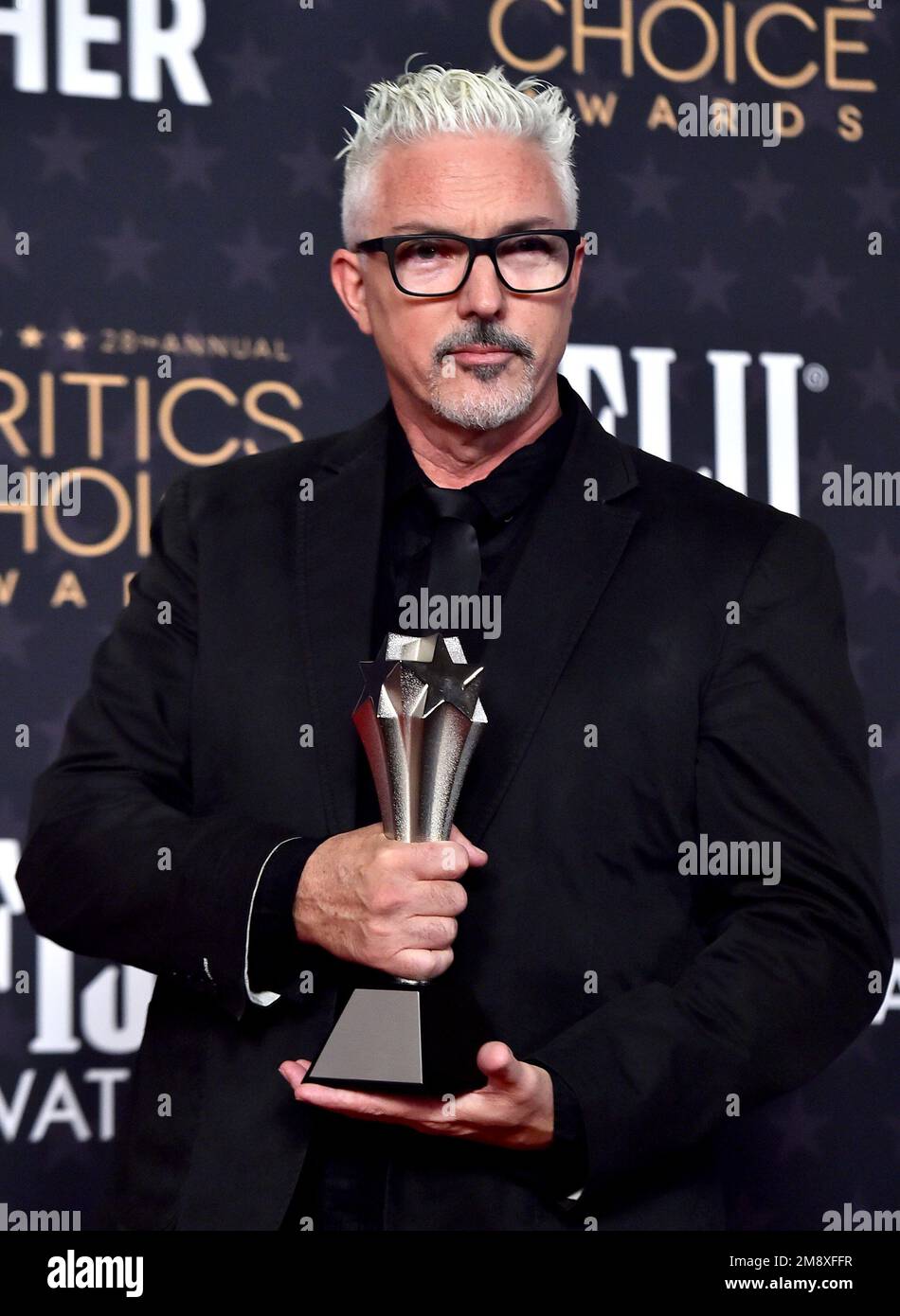 Jason Baird poses with the award for best hair and makeup for "Elvis ...