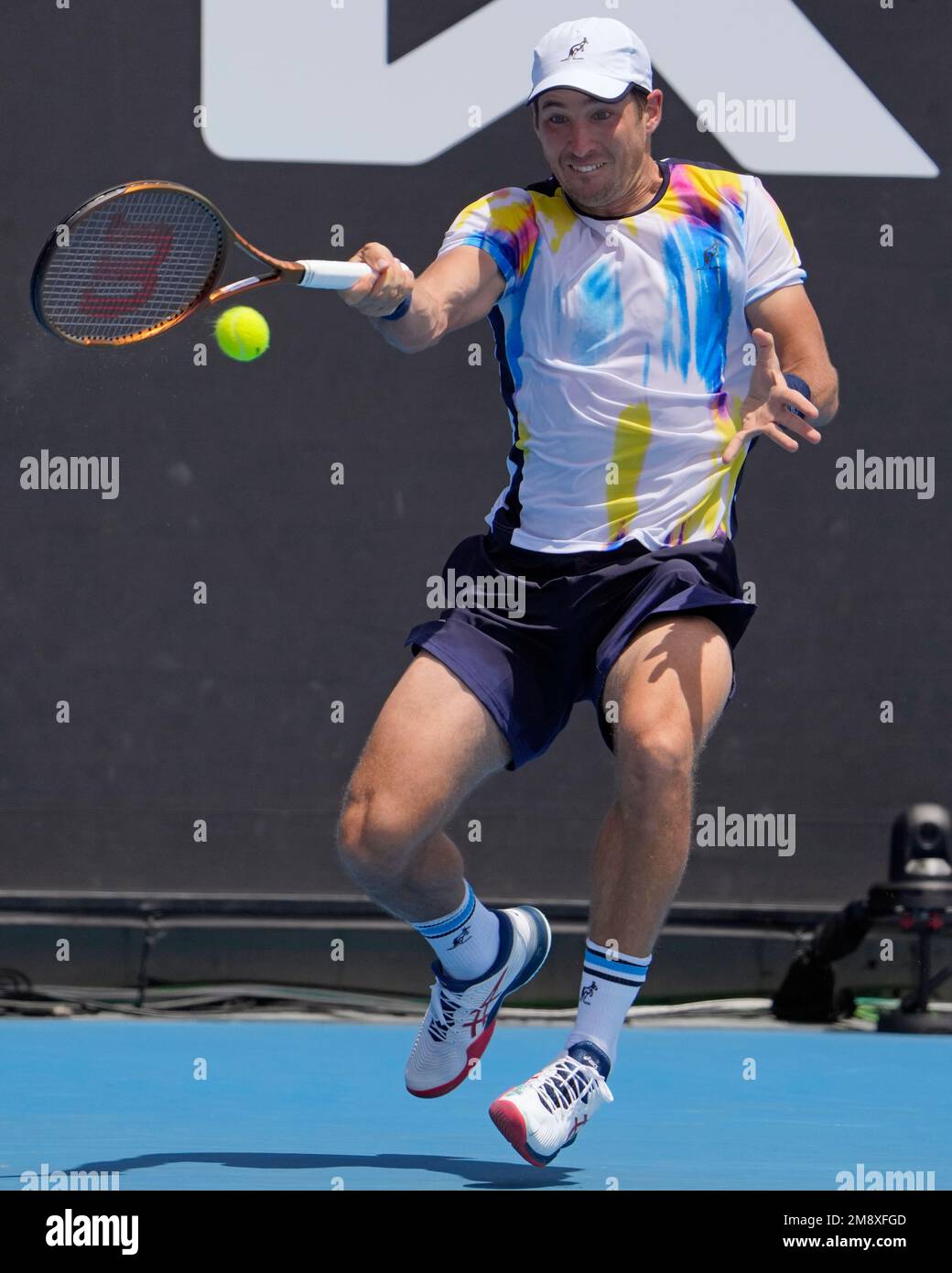 Dusan Lajovic of Serbia plays a forehand return to Denis Shapovalov of ...