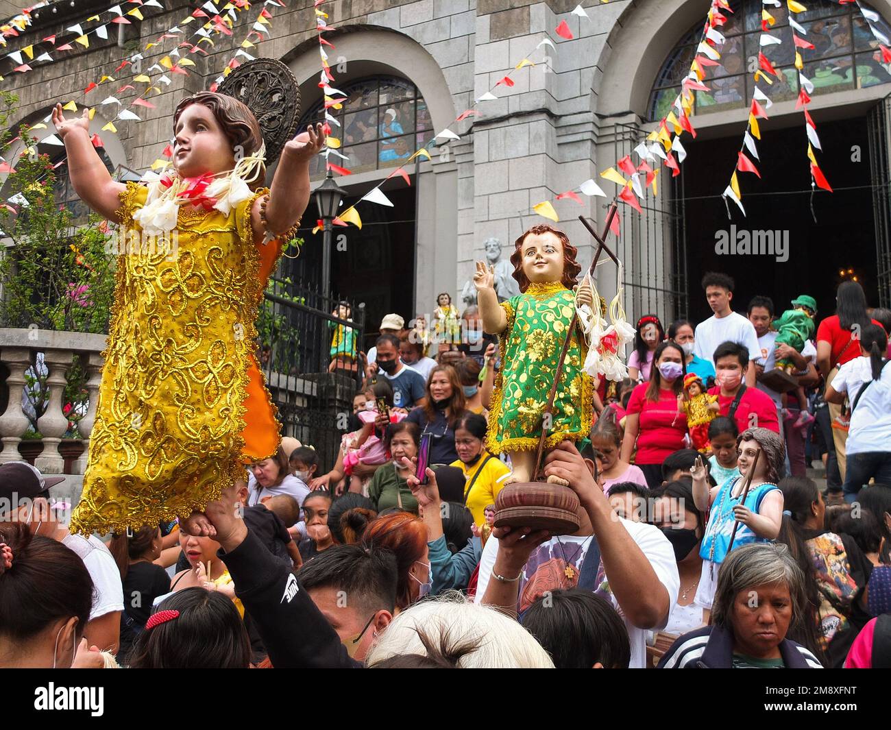 Different kinds of the Santo Niño brought by their owner parading after ...
