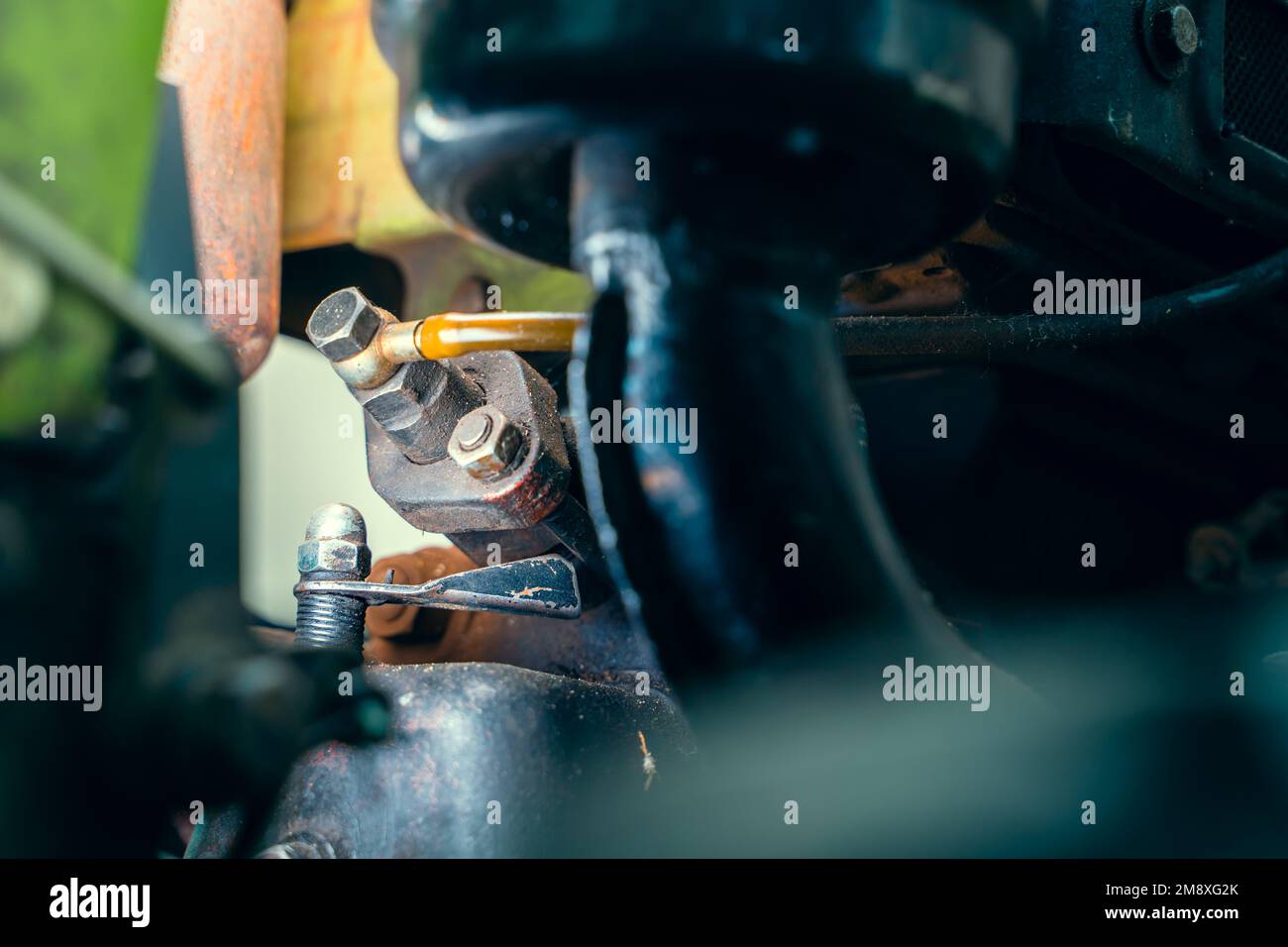 The handle of the decompressor of a walk-behind tractor close-up ...